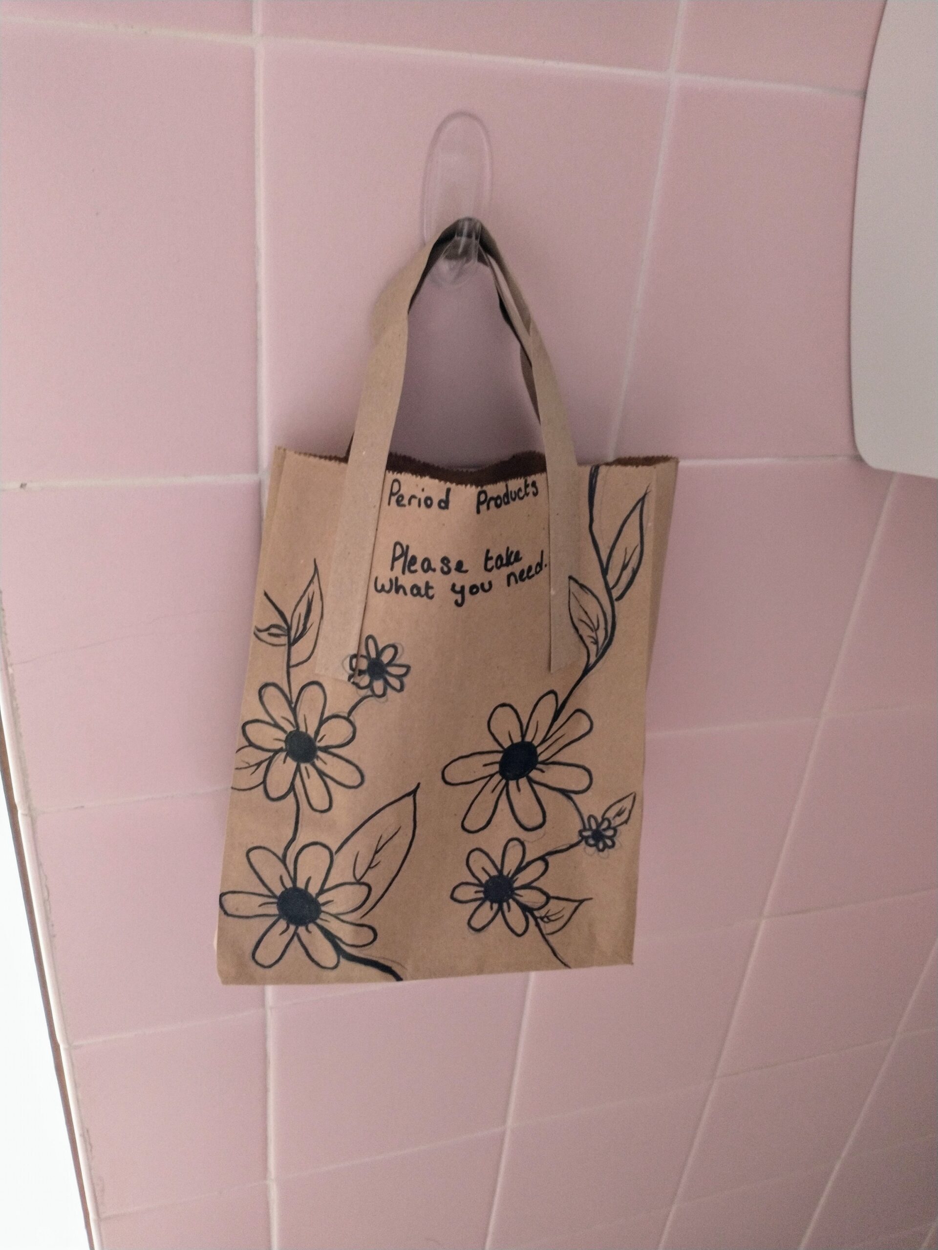 Seeing free period products brings smile on a hard day. - Time for Kindness
