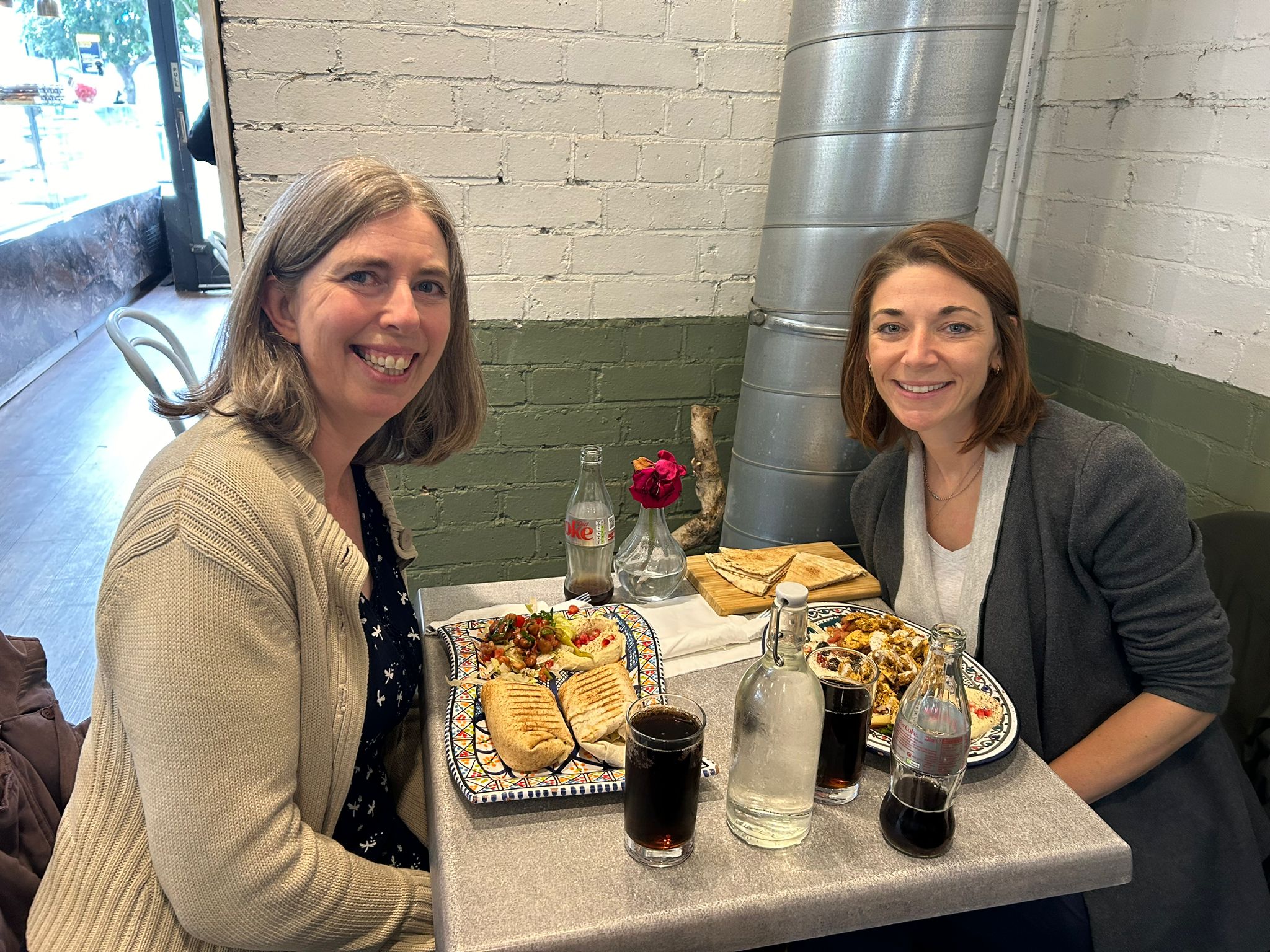 Cafe owner takes photo of friends. - Time for Kindness